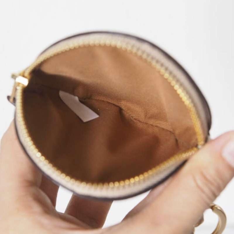 Jual Coach circular coin pouch bag charm in signature canvas di Seller ...