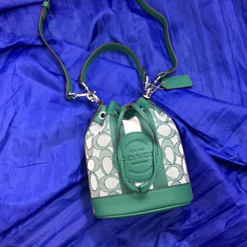 Promo Coach Dempsey Drawstring Mini Bucket Bag in Signature Jacquard ...