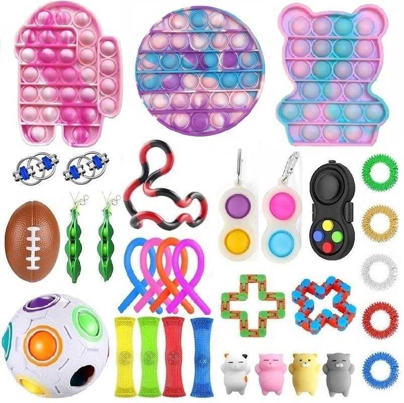 Jual 100 Designs Fidget Toy Set Box Sensory Fidget Toys Pack for Kids ...