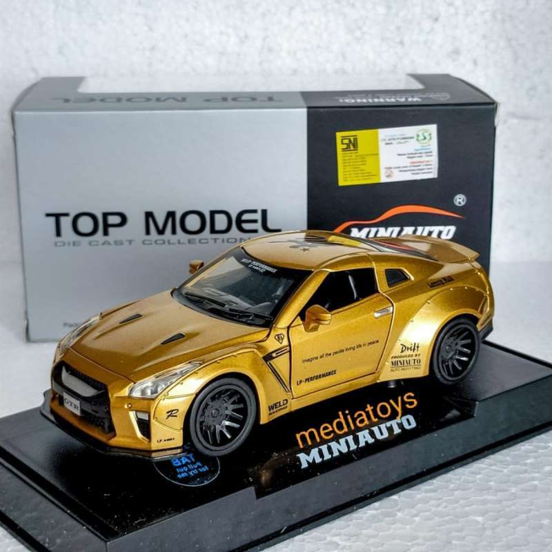Jual diecast 1:32 miniauto nissan gtr R35 warna gold-emas di Seller ...