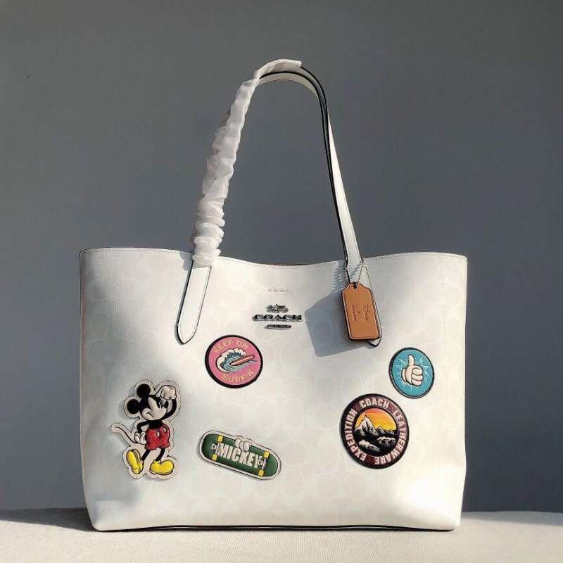 Jual Coach x Disney Tote Bag Signature Canvas Avenue Disney Mickey ...