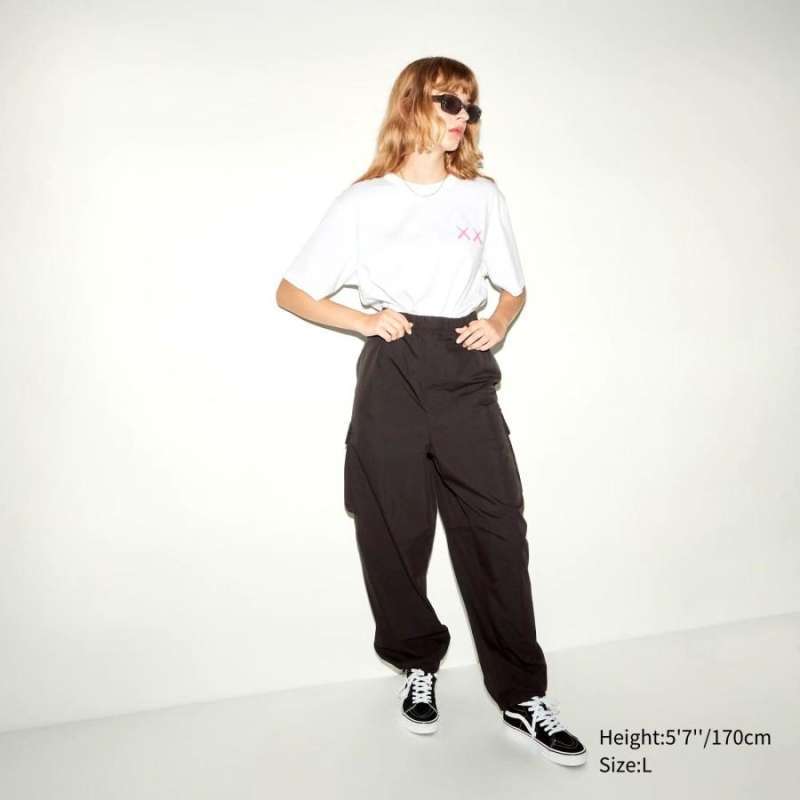 Promo Uniqlo x Kaws Pink Figure Lying Down White Tee - Original Diskon ...