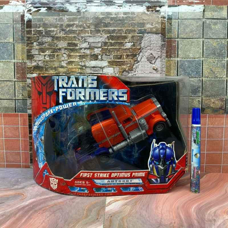 Promo Mainan Transformers Movie Voyager First Strike Optimus Prime ...