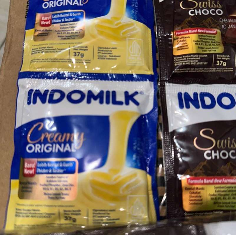 Jual Indomilk Susu Sachet Putih Dan Coklat Creamy Original Dan Swiss ...